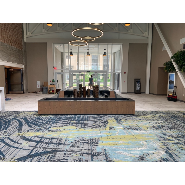 Reflection Pool With Stone Sculptures Overflowing At Embassy Suites By ...